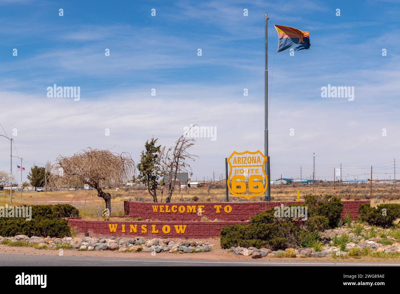 Sign on the eastern end of the city along historic Route 66 welcomes ...