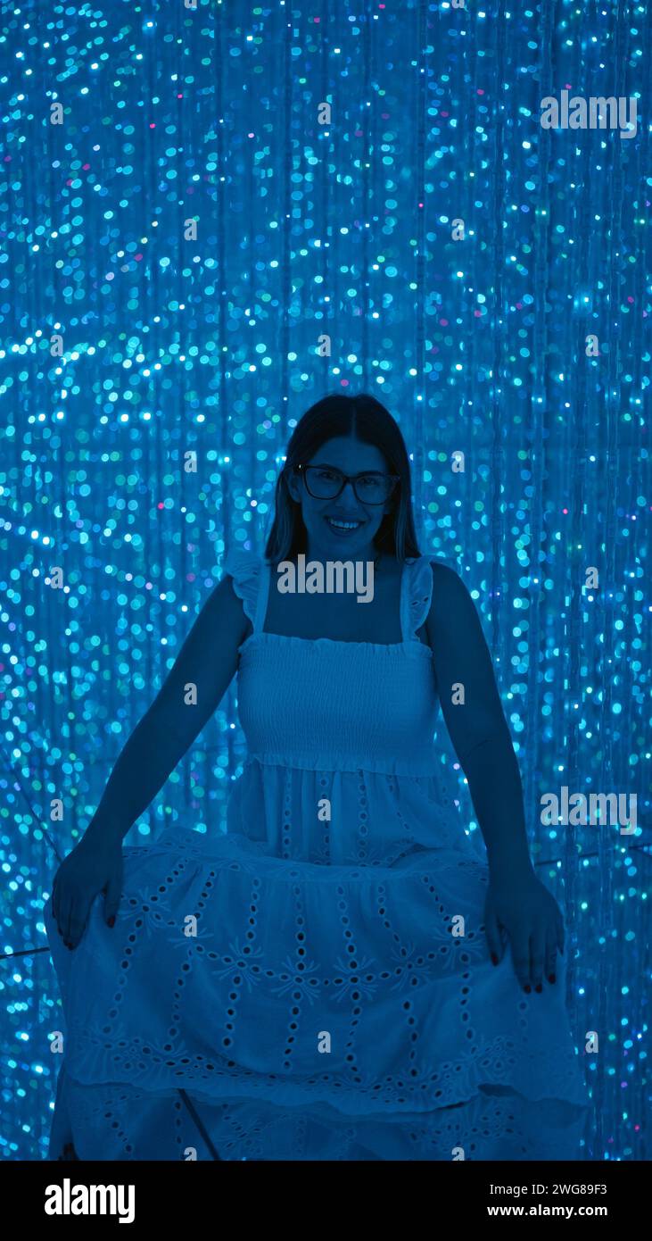 Smiling beautiful hispanic woman experiencing immersive futuristic ...