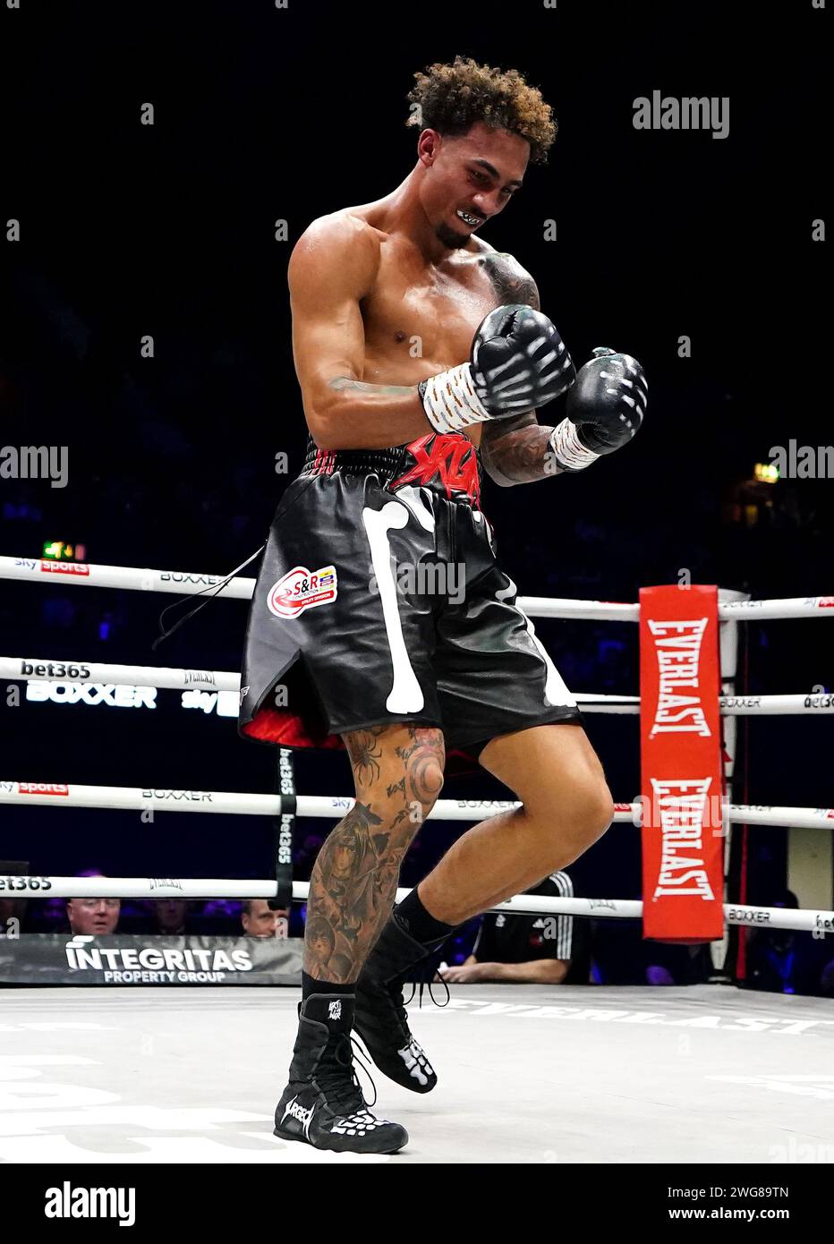 Ben Whittaker celebrates at the end of a round in the light-heavyweight ...