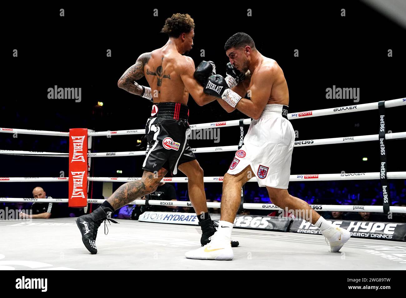 Ben Whittaker (left) in action against Khalid Graidia in the light ...