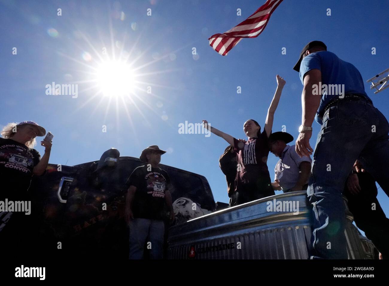 Felecia Hicks, center, celebrates after she was baptized during the ...