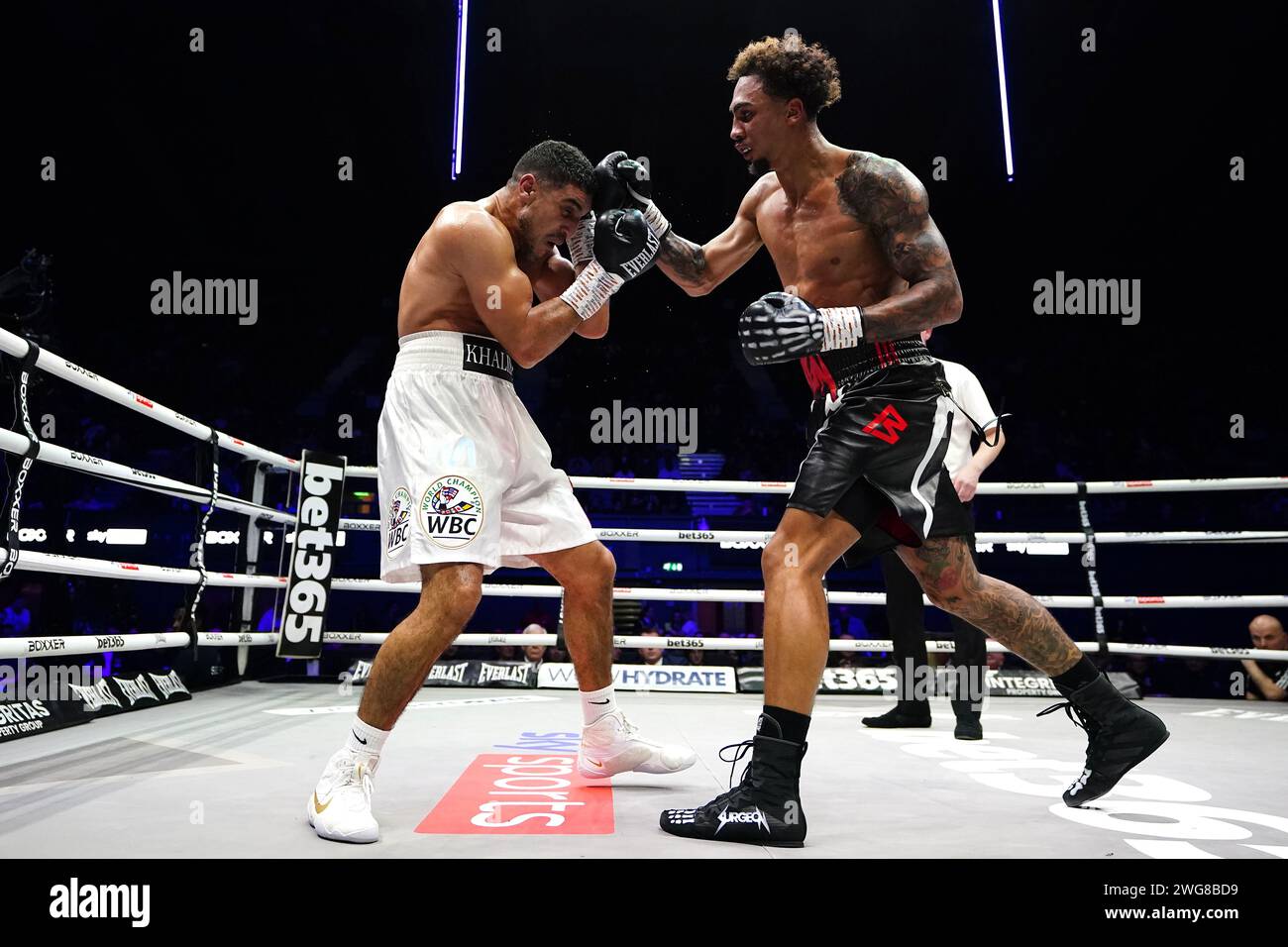 Ben Whittaker (right) in action against Khalid Graidia in the light ...