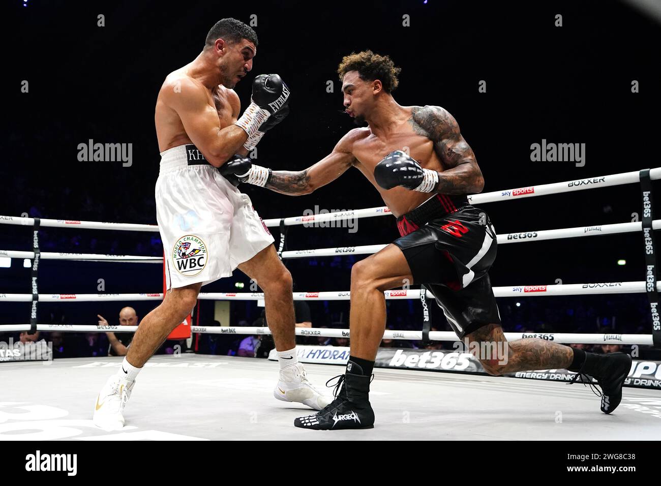 Ben Whittaker (right) in action against Khalid Graidia in the light ...
