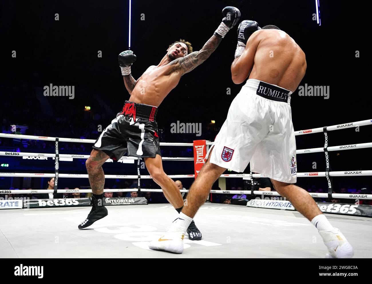 Ben Whittaker (left) in action against Khalid Graidia in the light ...