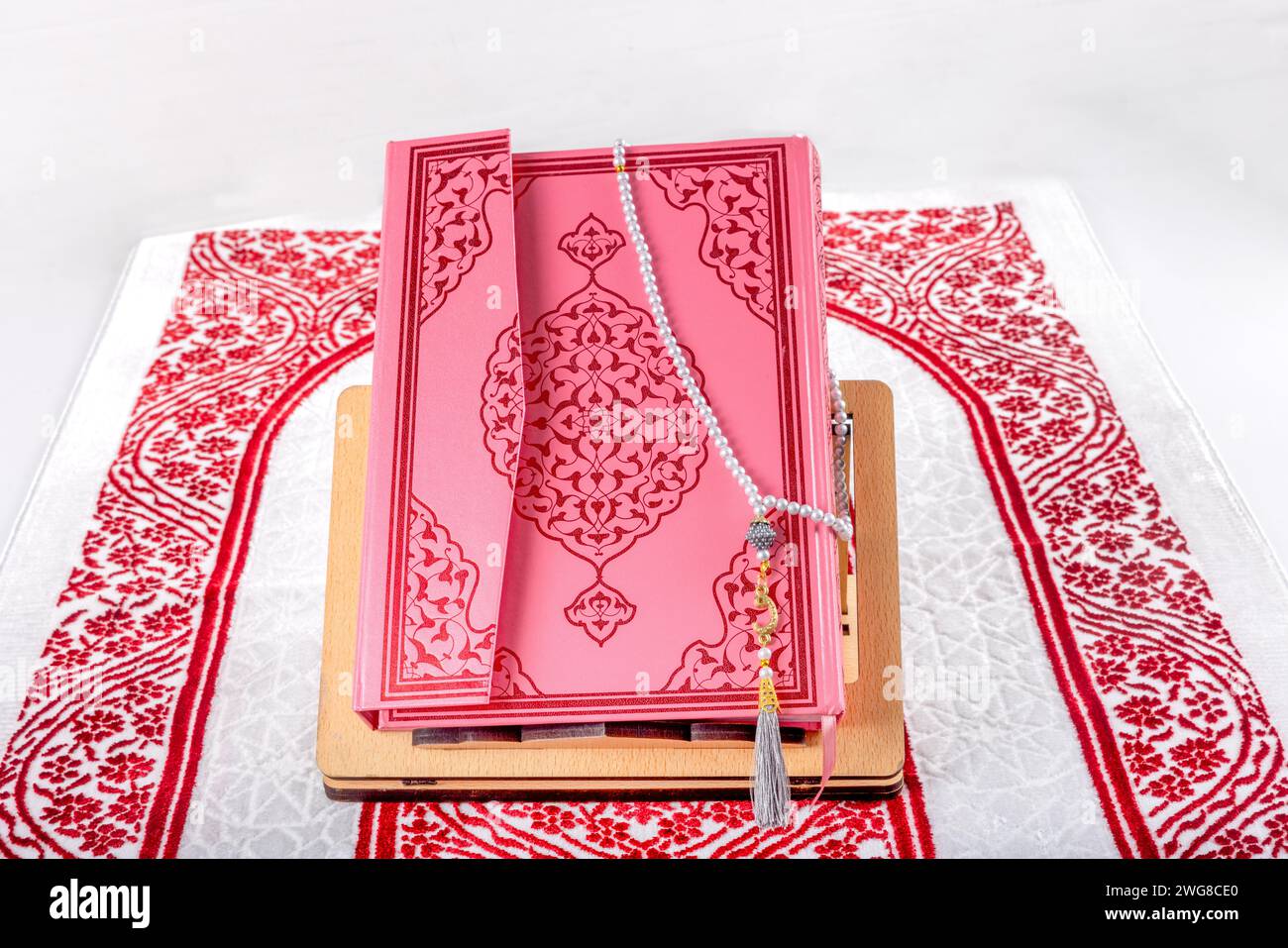 Istanbul, Türkiye - January 28, 2024; Quran on prayer mat. Quran and ...