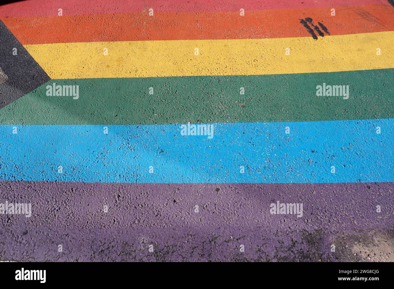 The LGBTQ signis painted in the steet Stock Photo - Alamy