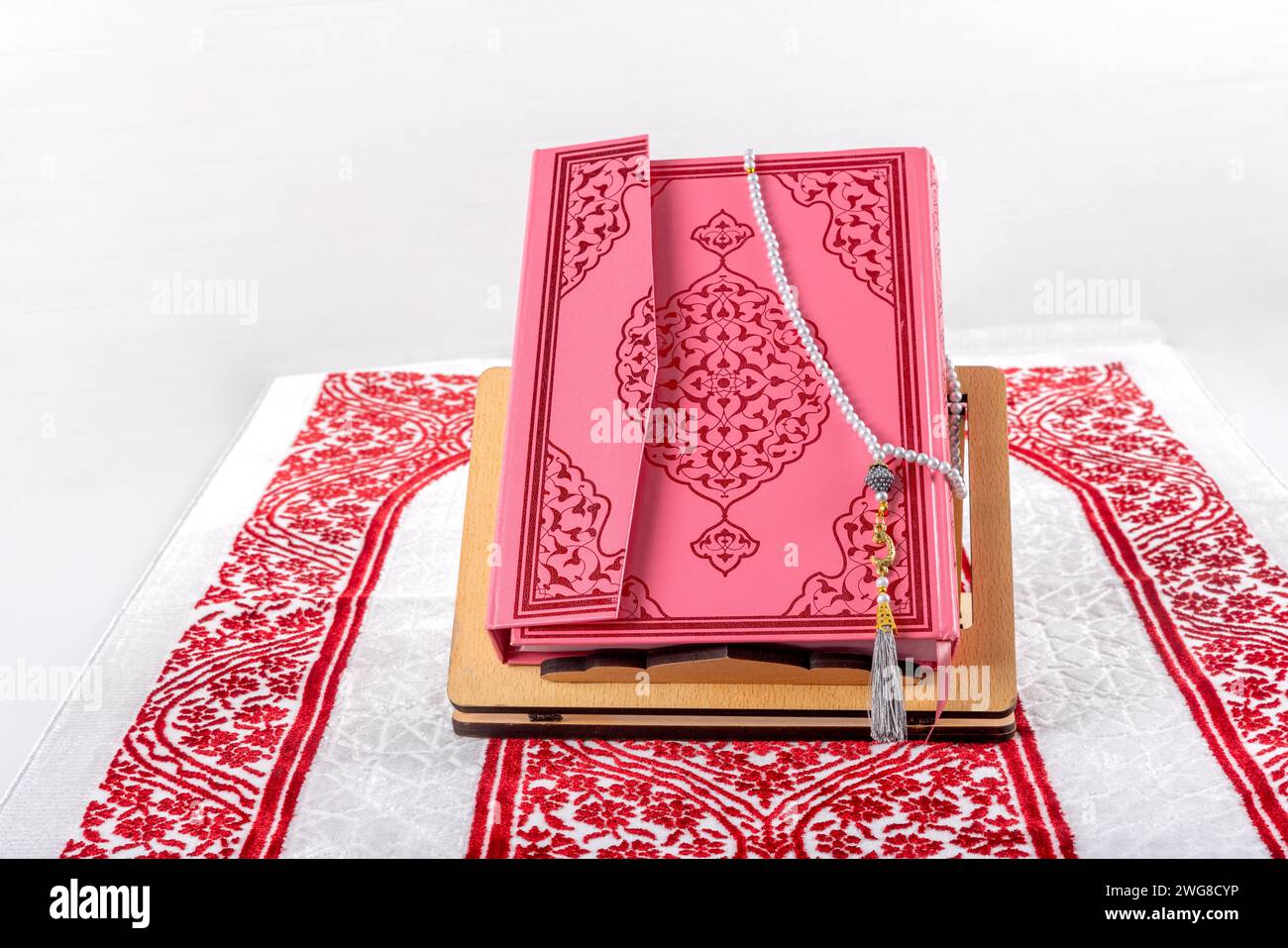Istanbul, Türkiye - January 28, 2024; Quran on prayer mat. Quran and ...