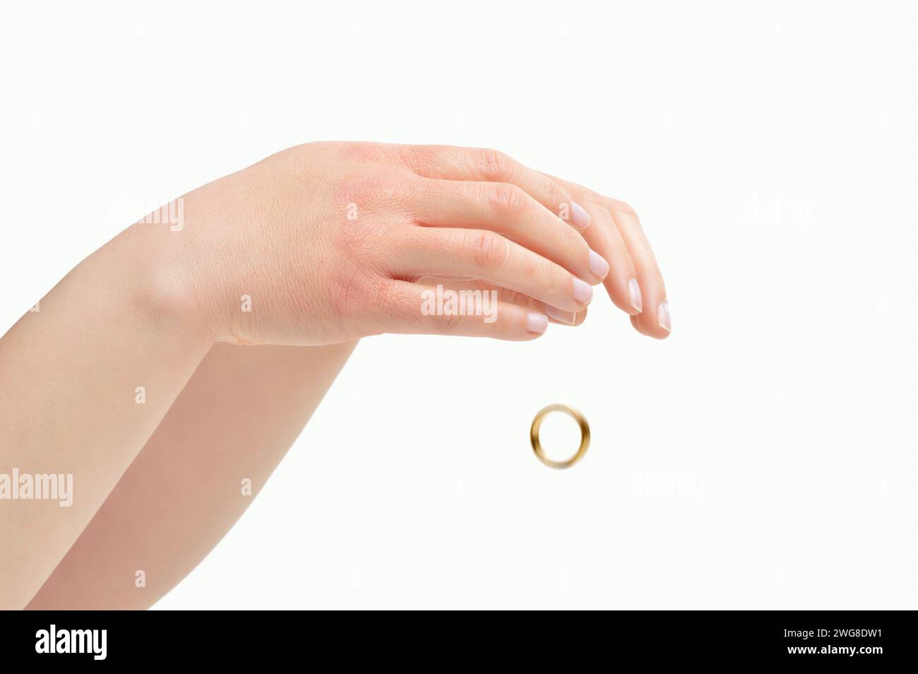 Sad wife hands dropping her wedding ring marriage problems concept ...