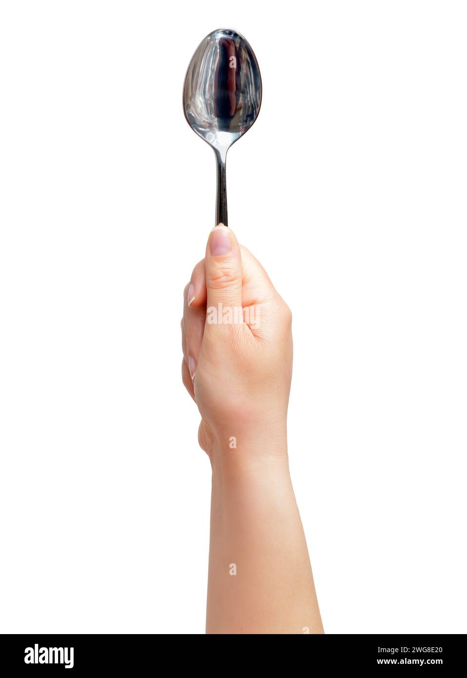 Woman hand holding up a spoon isolated on a white background Stock ...