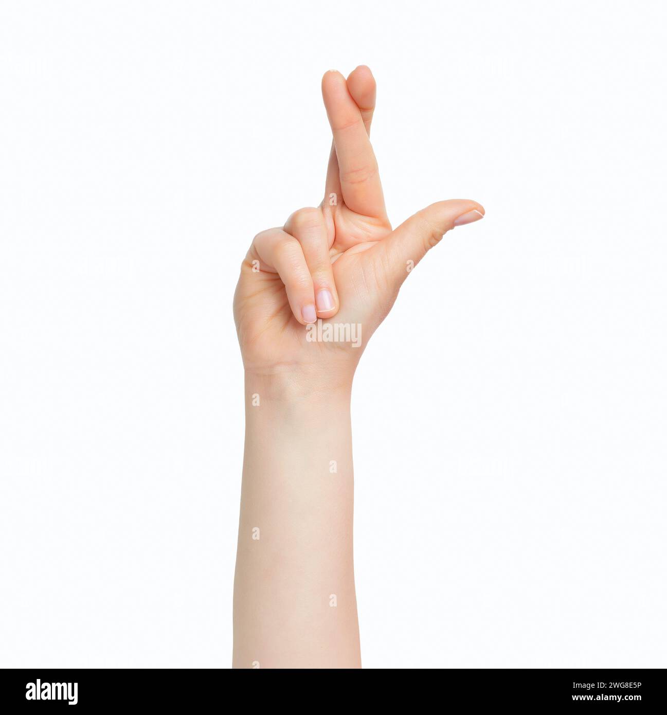 Woman hand crossing fingers on a white isolated background Stock Photo ...
