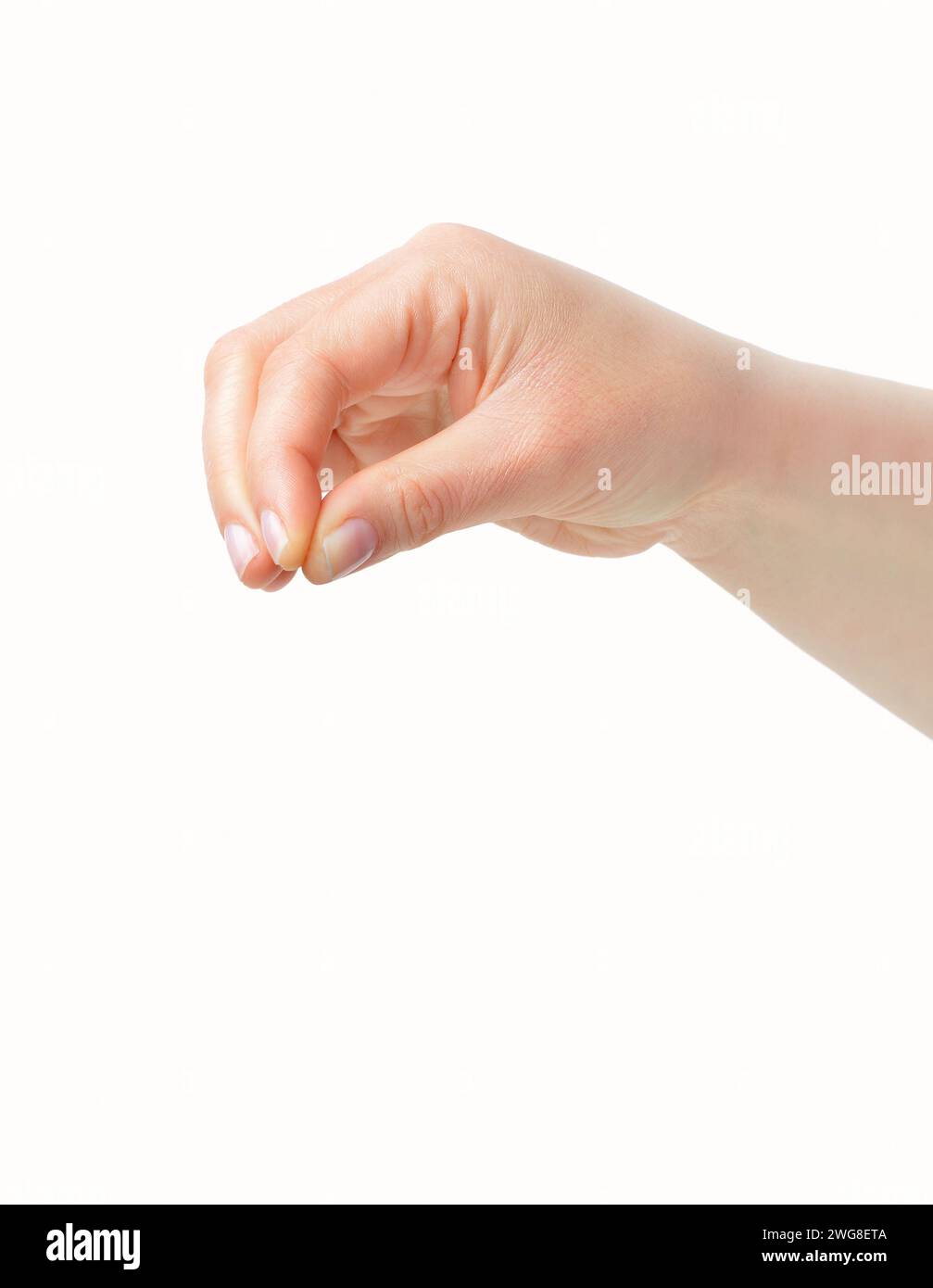 Woman hand hanging something blank isolated on a white background Stock ...