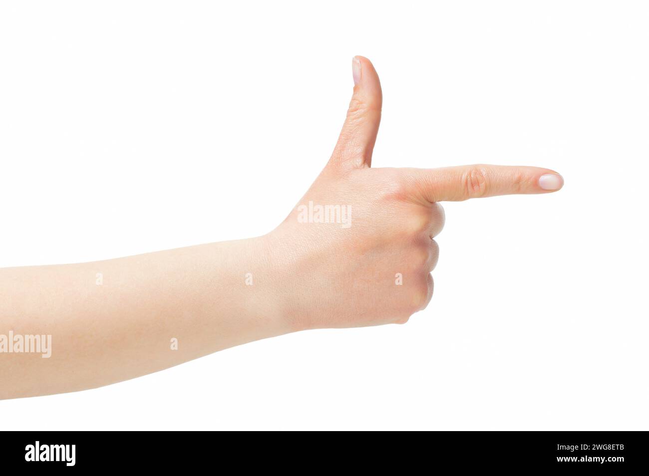 Woman hand showing forefinger in gun sign on a white isolated ...