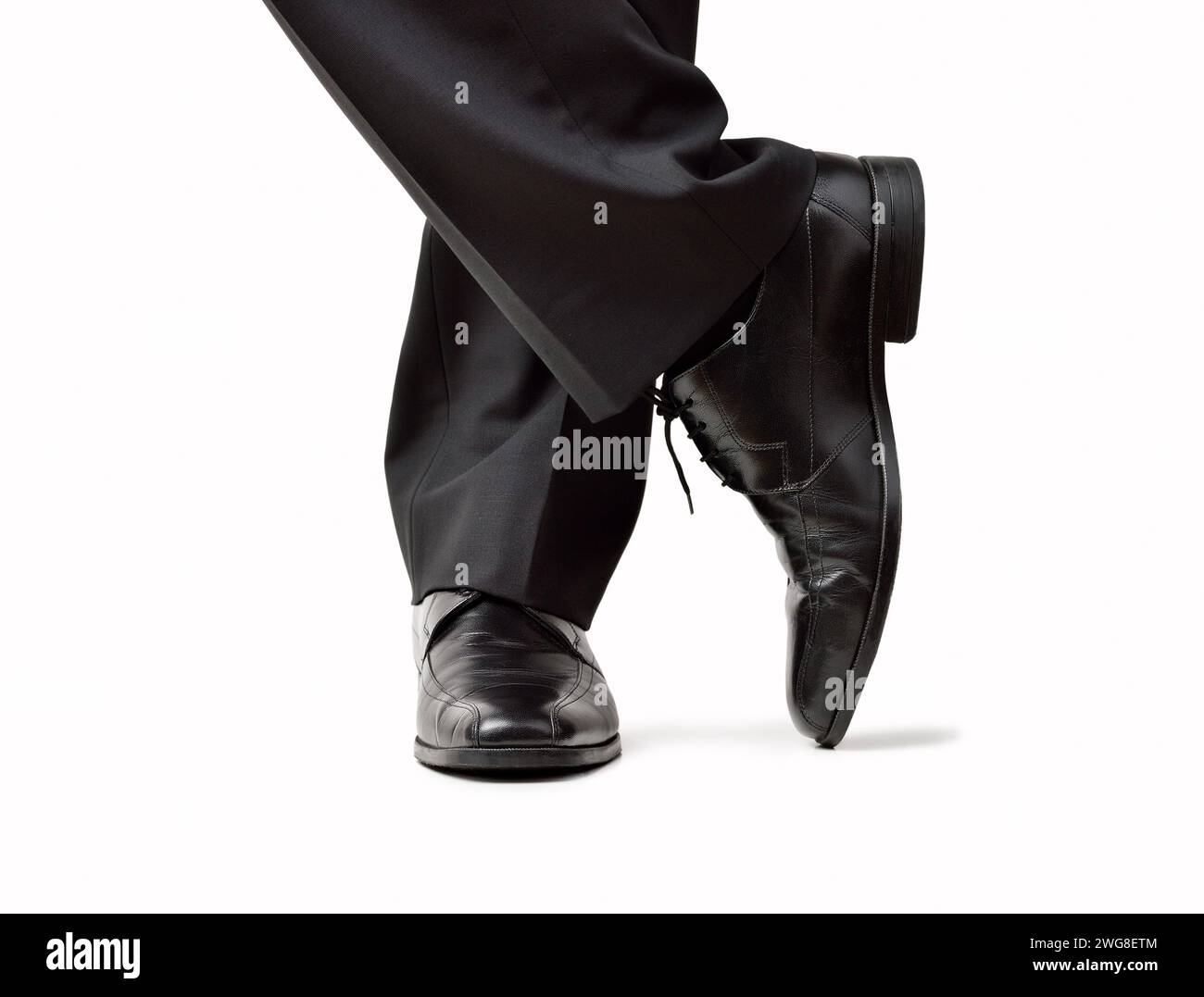 Cropped shot of a young businessman standing isolated in white with ...