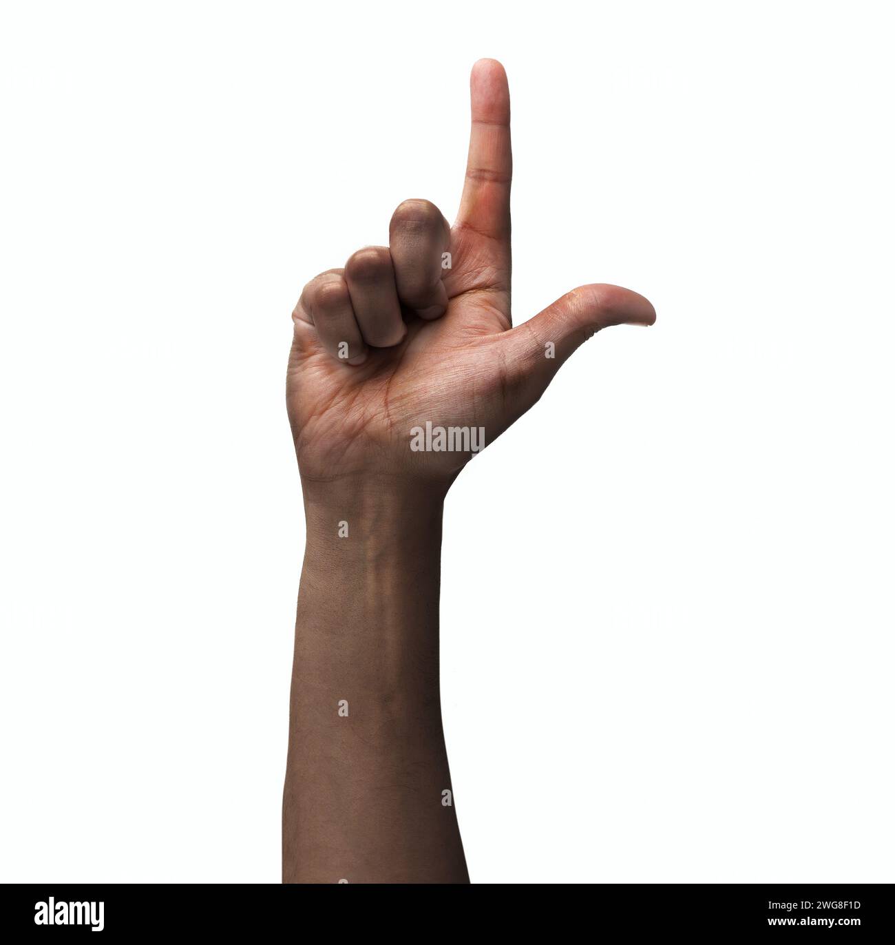 Man hand showing forefinger up and number one sign in a white isolated ...