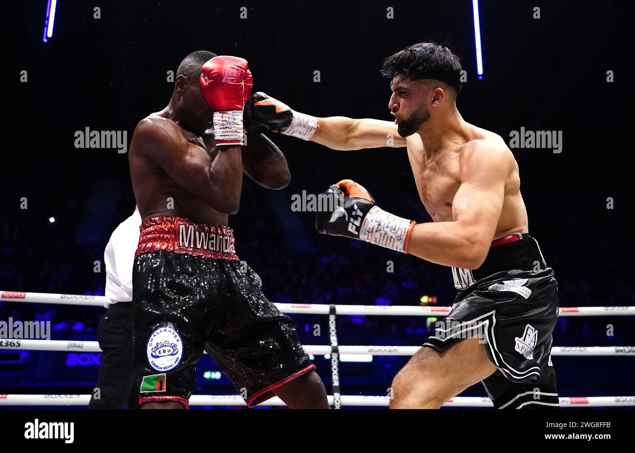 Adam Azim (right) in action against Enock Poulsen in the Euro Super ...