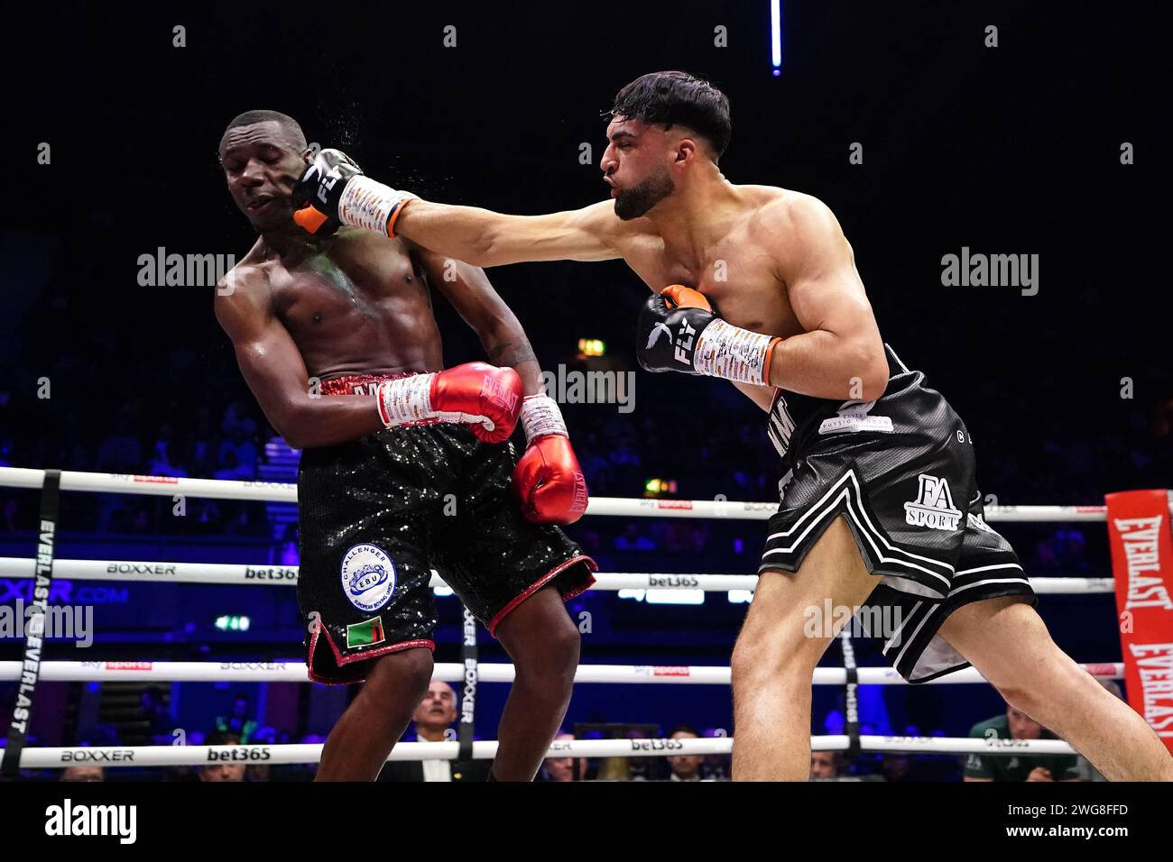 Adam Azim (right) in action against Enock Poulsen in the Euro Super ...