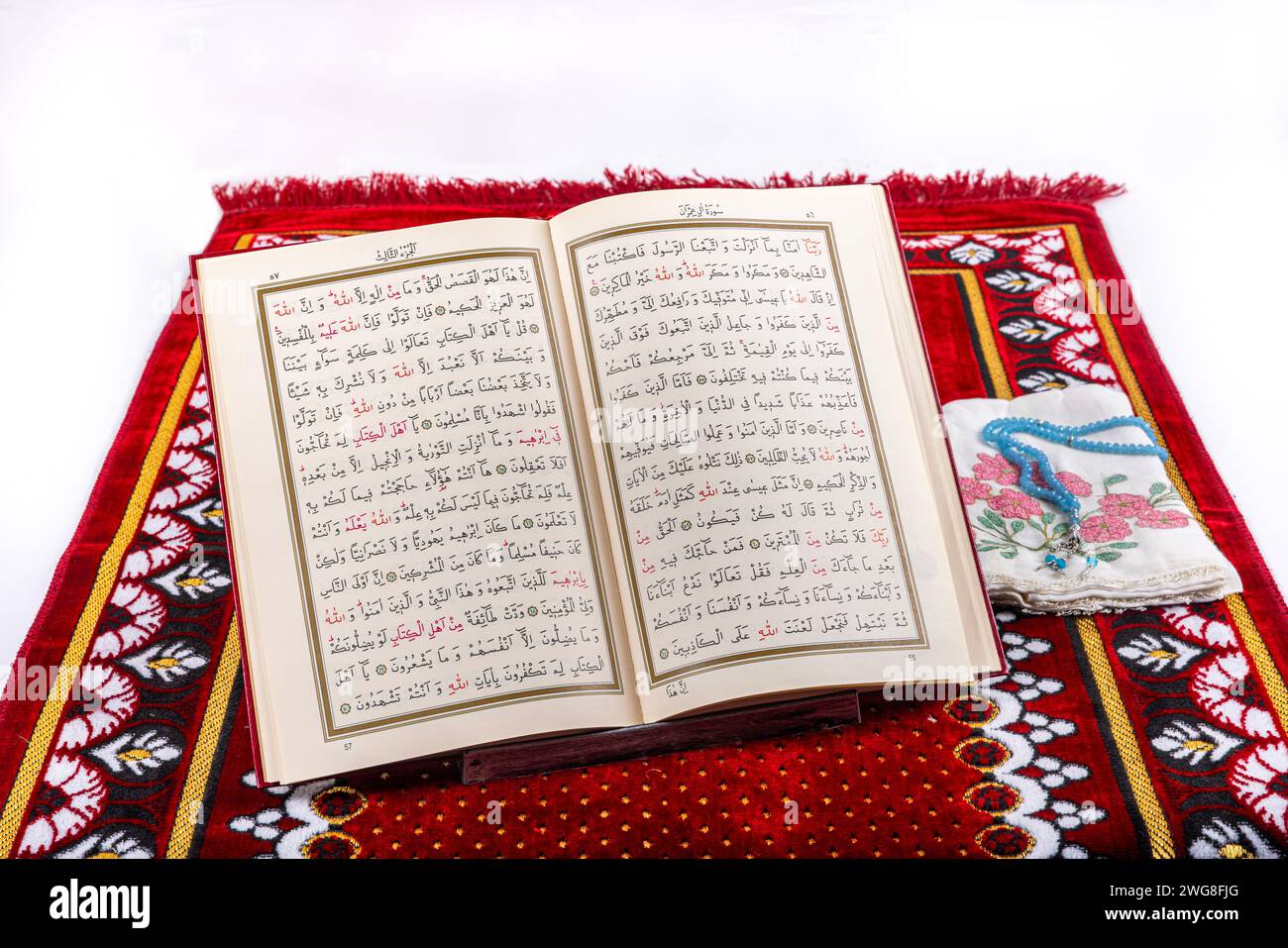 Istanbul, Türkiye - January 28, 2024; Quran on prayer mat. Quran and ...