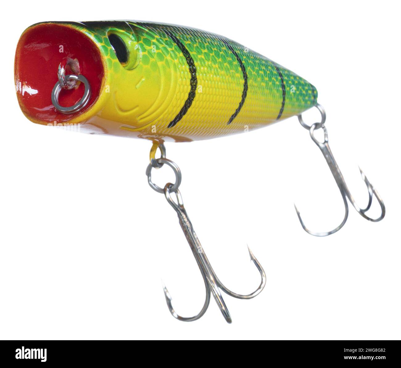 Yellow and green artificial topwater fishing bait with red around the ...