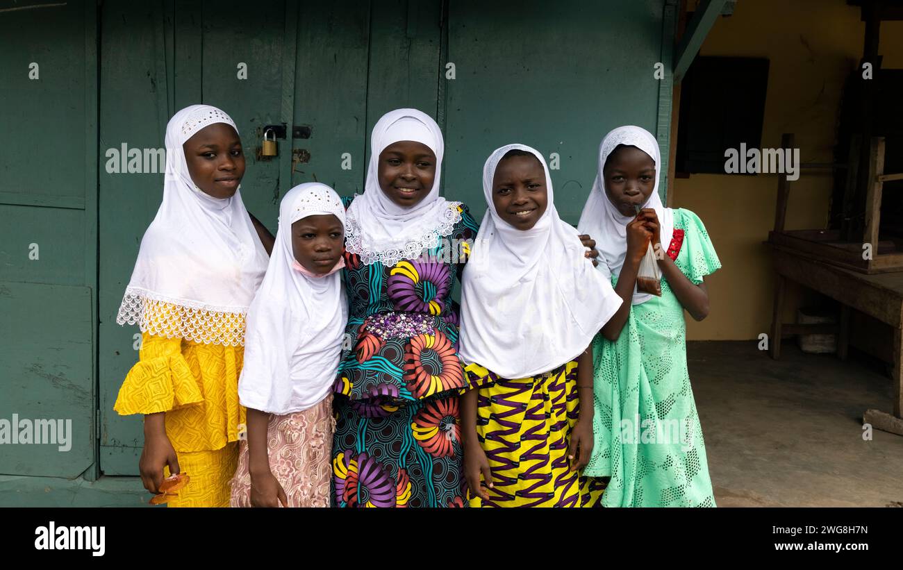 Five young girls Muslin friends Nima Accra Ghana Africa. Poverty ...