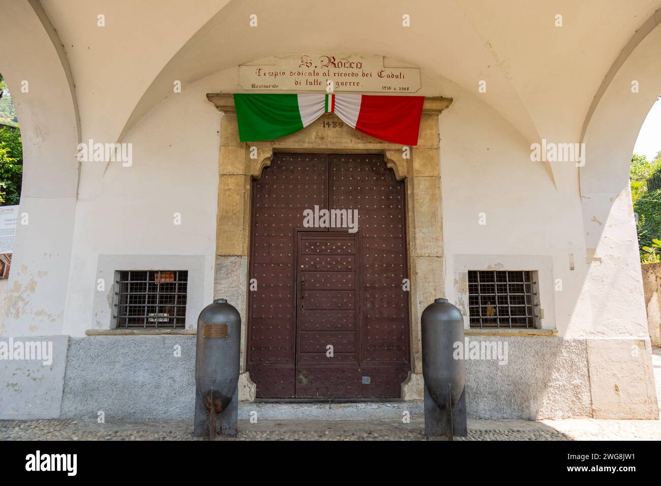 The door to the Church of Saint Rocco, seen between two bombs, in ...