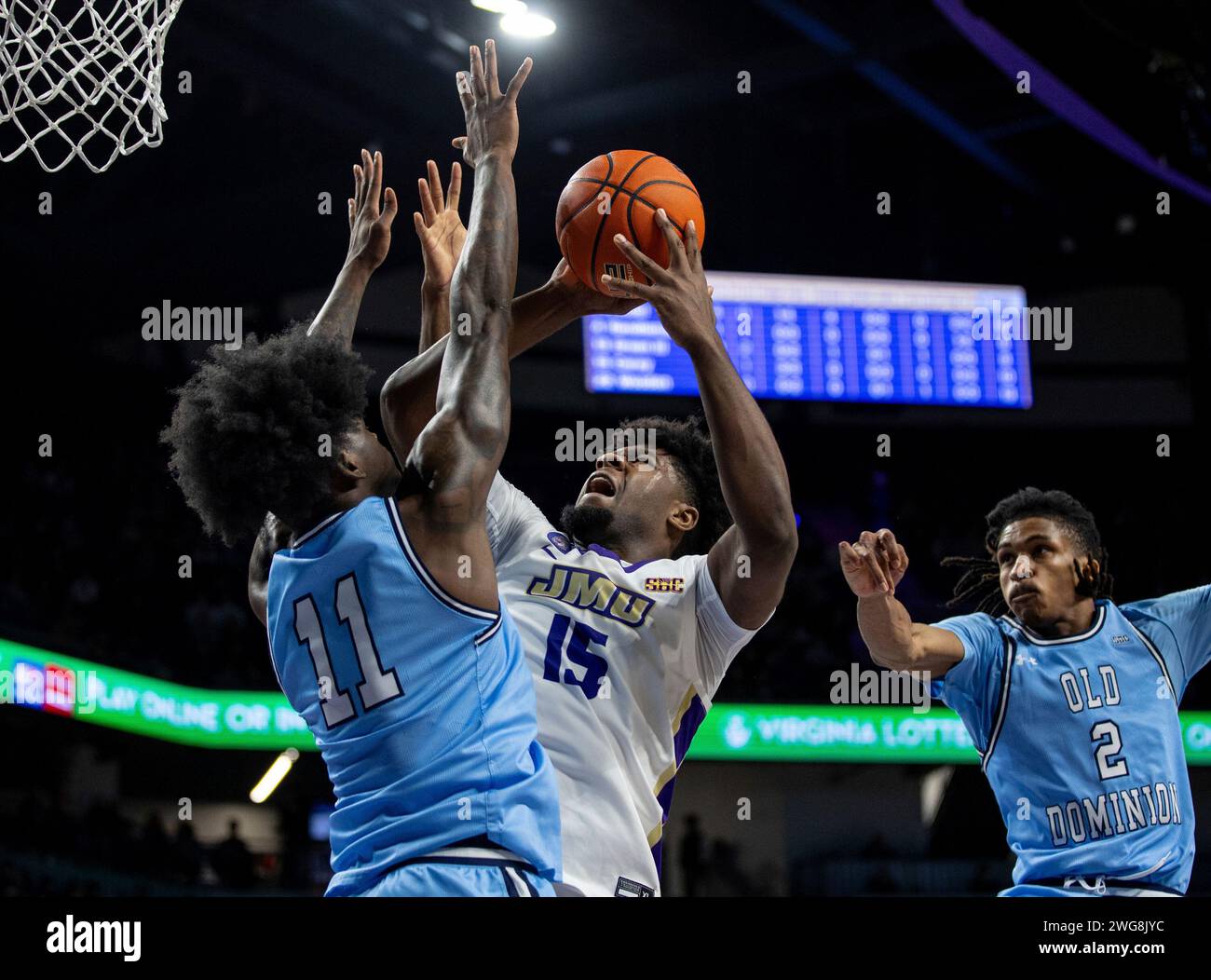 James Madison forward Jaylen Carey (15) takes a shot against Old ...