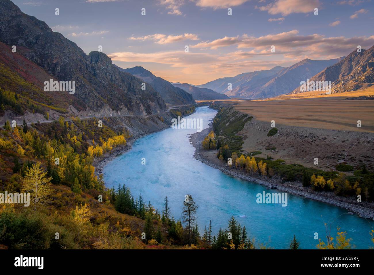The blue water of Katun river, the autumn trees, in the mountain valley ...