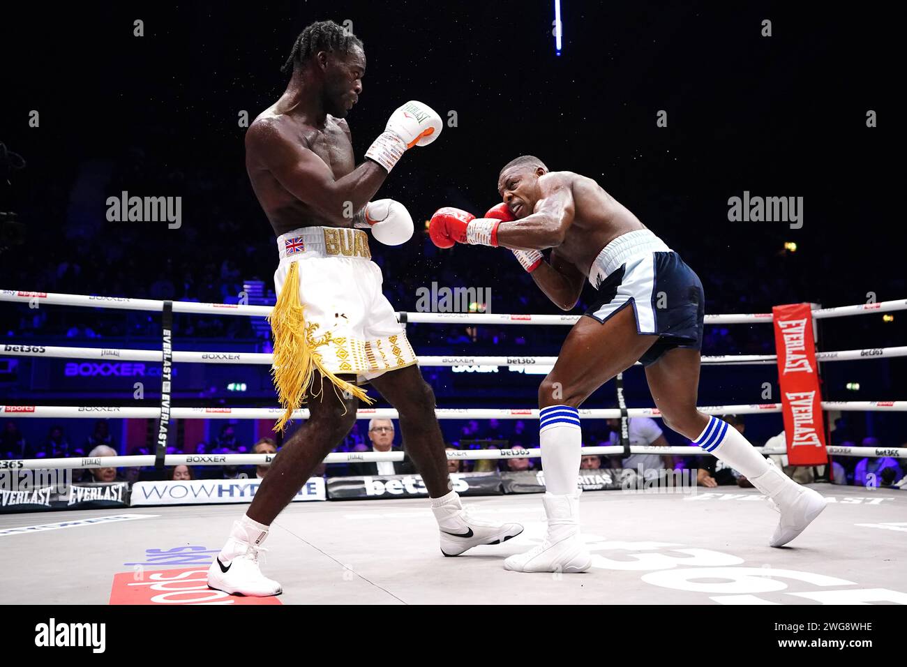 Joshua Buatsi (left) in action against Dan Azeez in the WBA Light ...