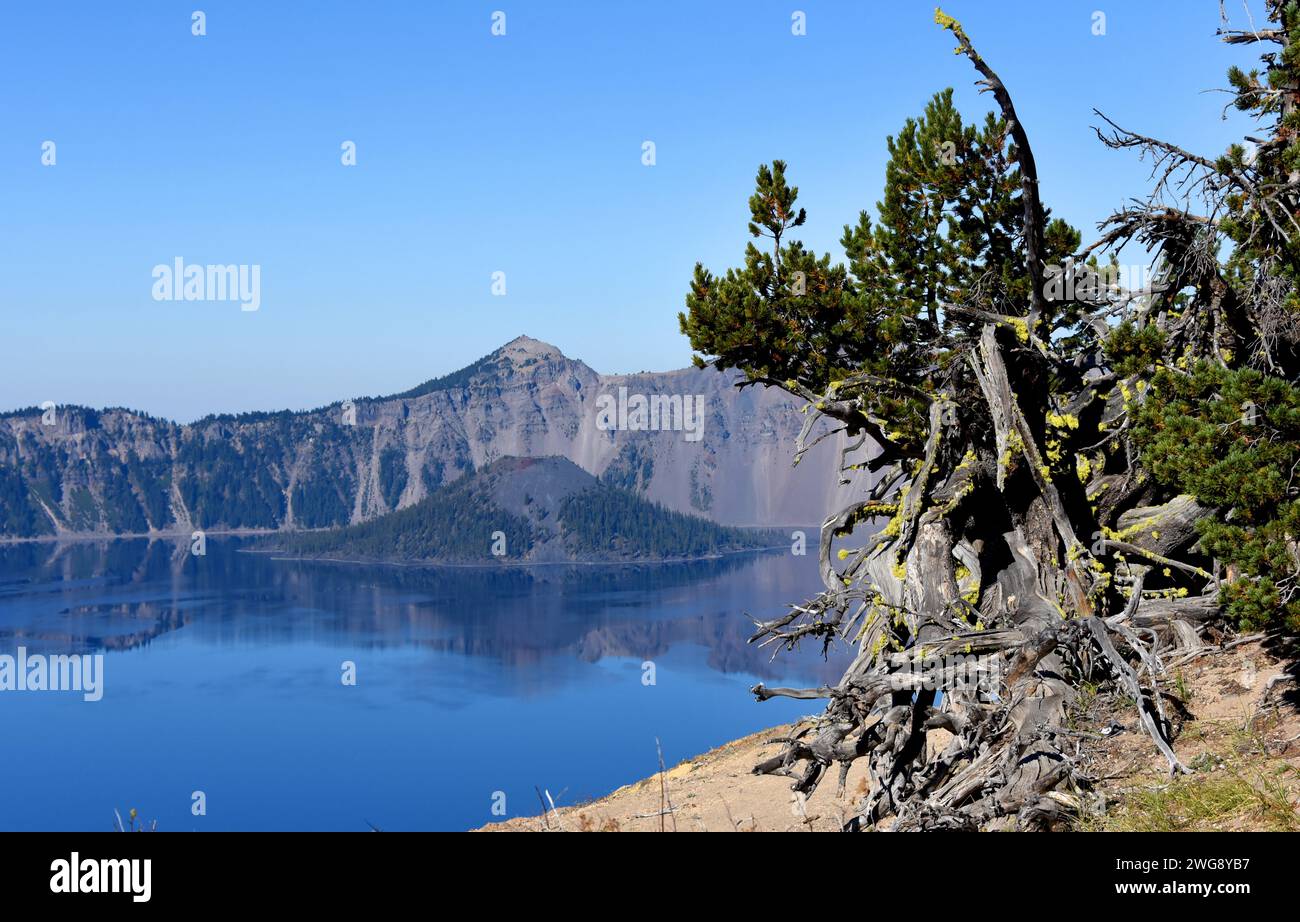 Wizard Island sits in Crater Lake, Crater Lake National Park, in Oregon ...