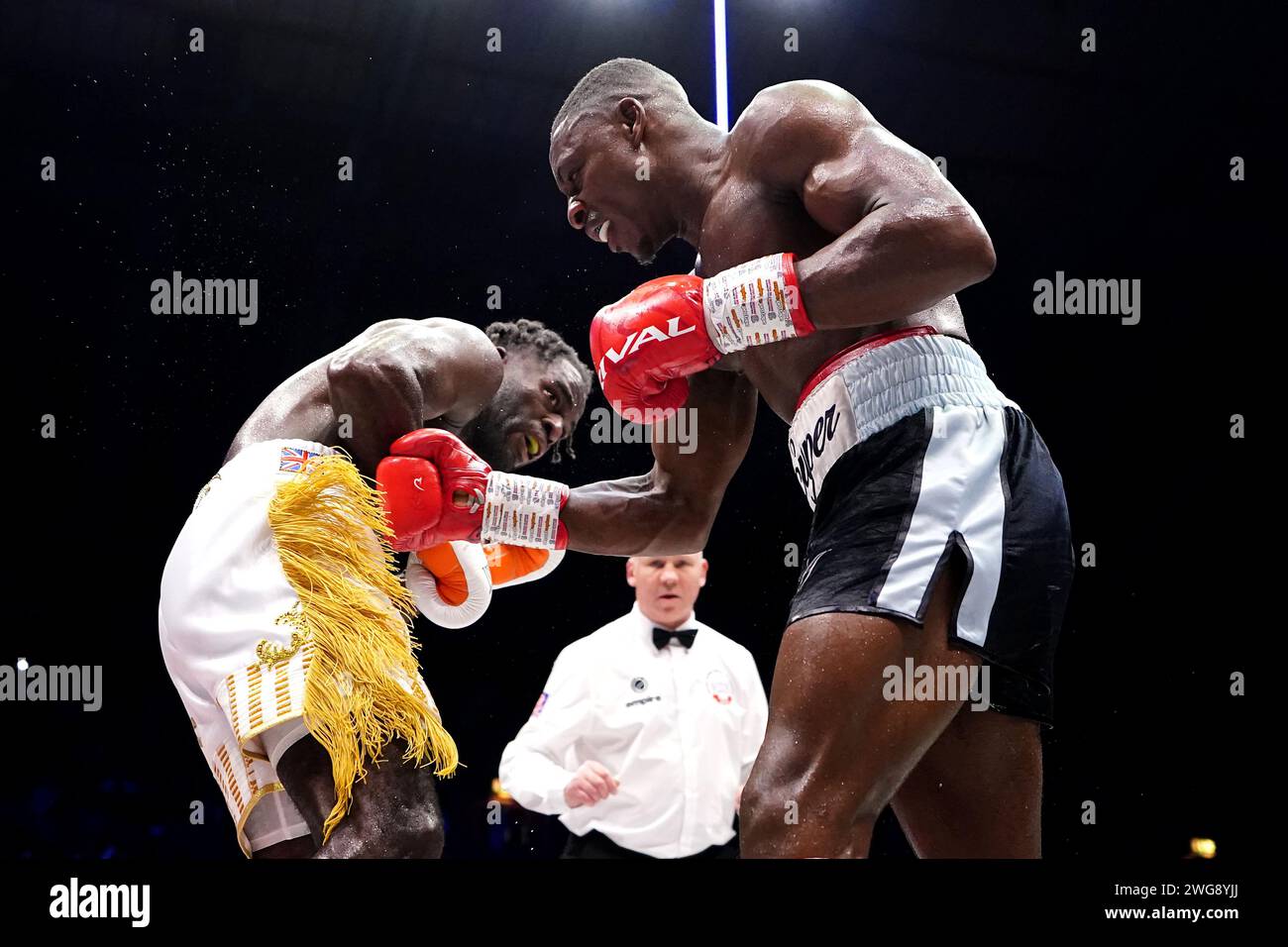 Dan Azeez (right) in action against Joshua Buatsi in the WBA Light ...