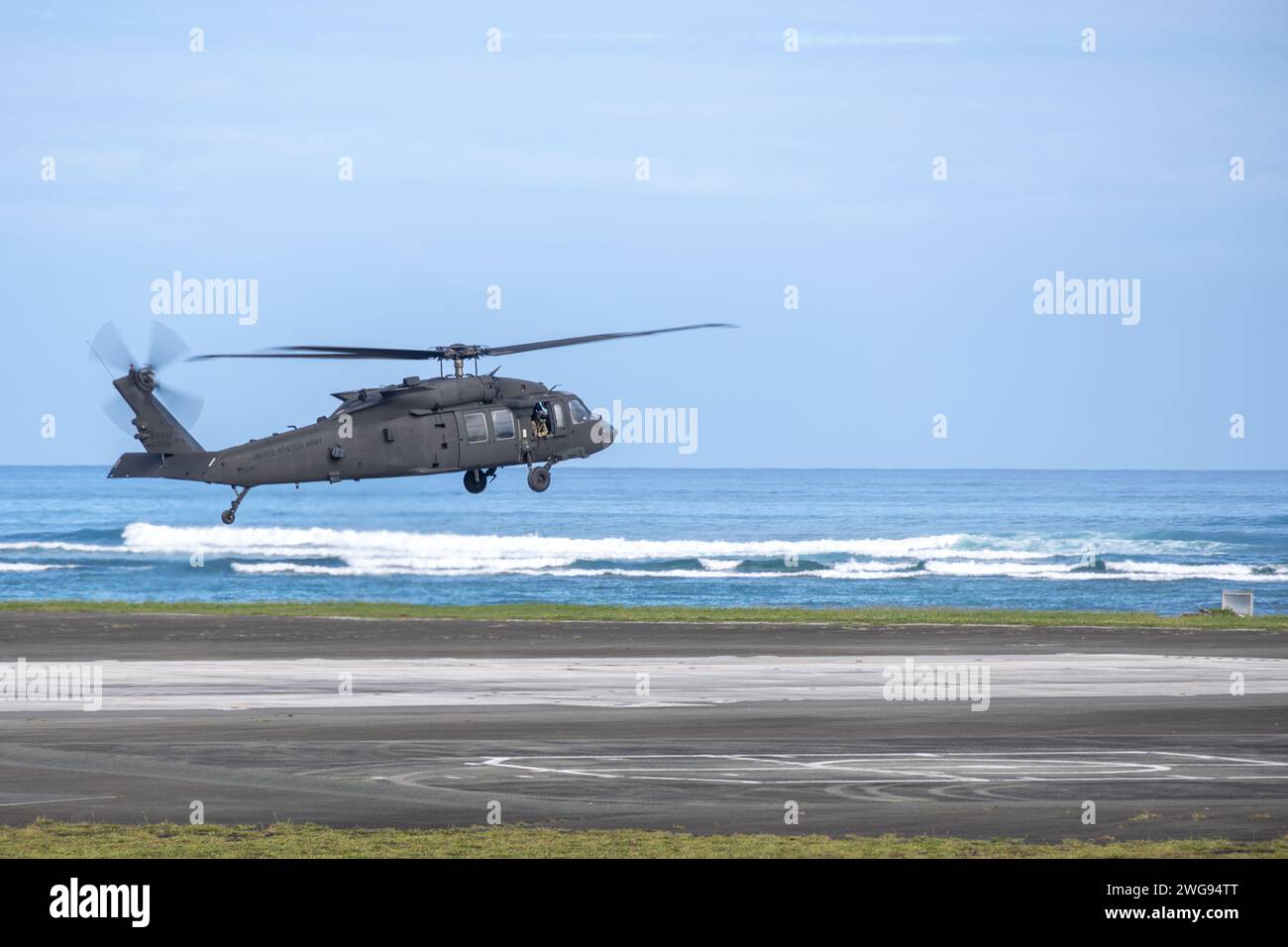 A U.S. Army UH-60 Black Hawk conducts training with U.S. Marines from ...