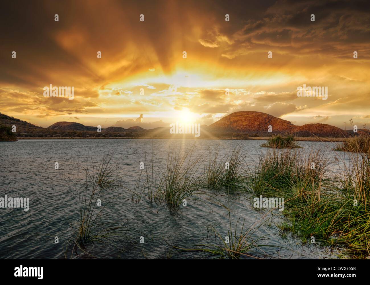 gaborone dam in botswana at sunset, southern africa typical landscape ...