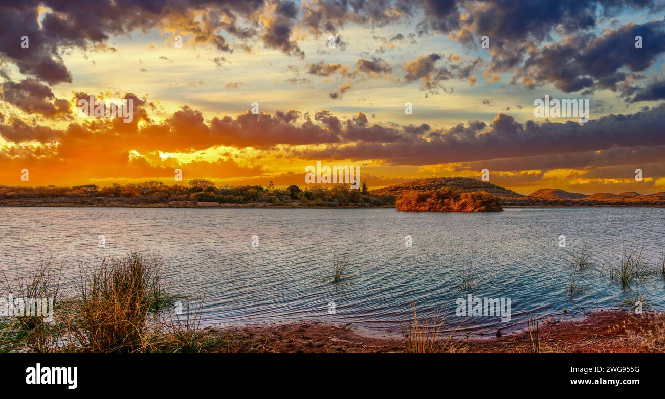 gaborone dam in botswana at sunset, southern africa typical landscape ...