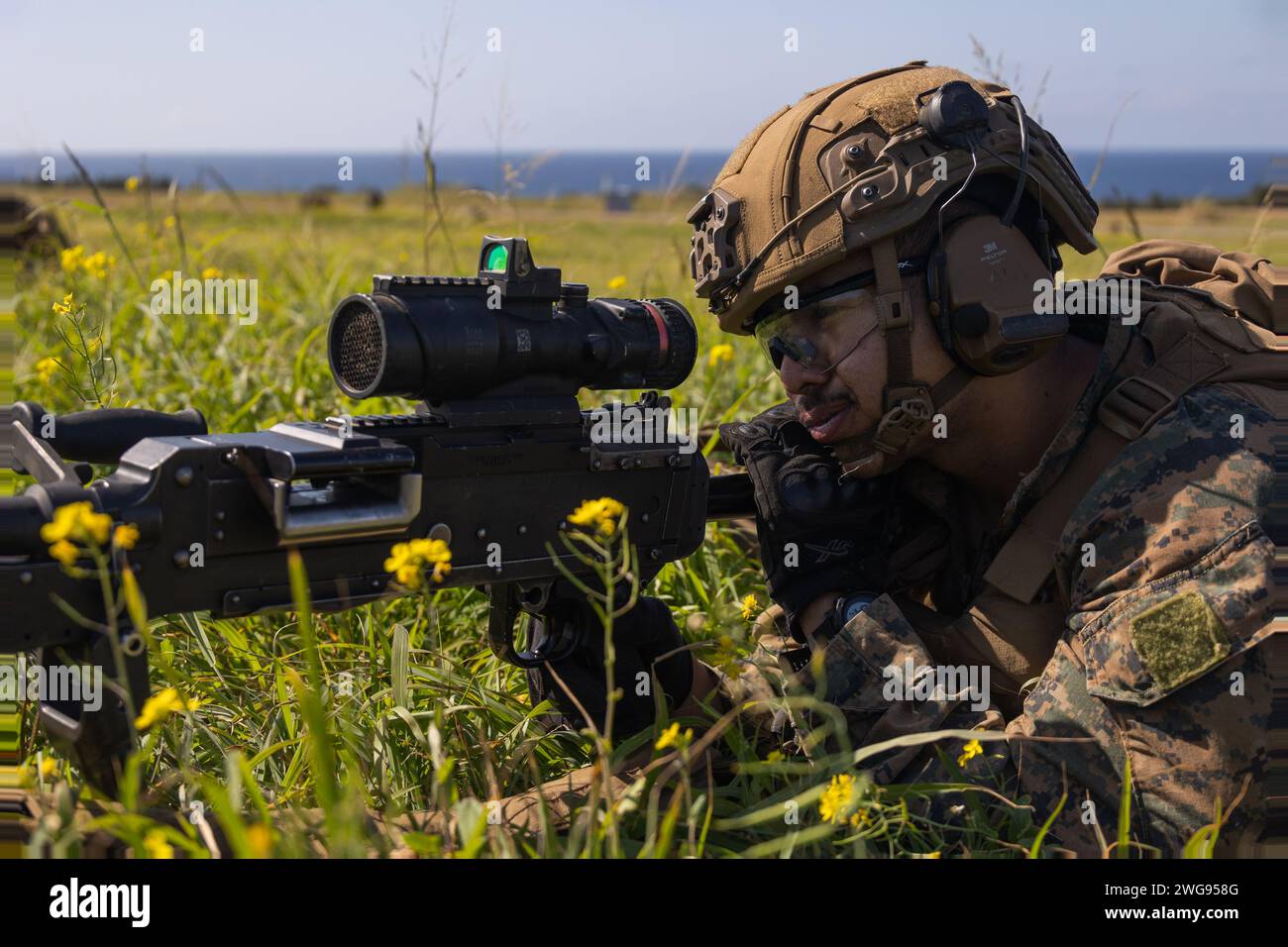 U.S. Marine Corps Lance Cpl. Hector Sarinana, a machine gunner with ...