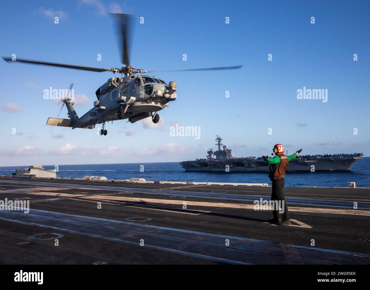 PHILIPPINE SEA (Feb. 2, 2024) An MH-60R Sea Hawk, assigned to the ...