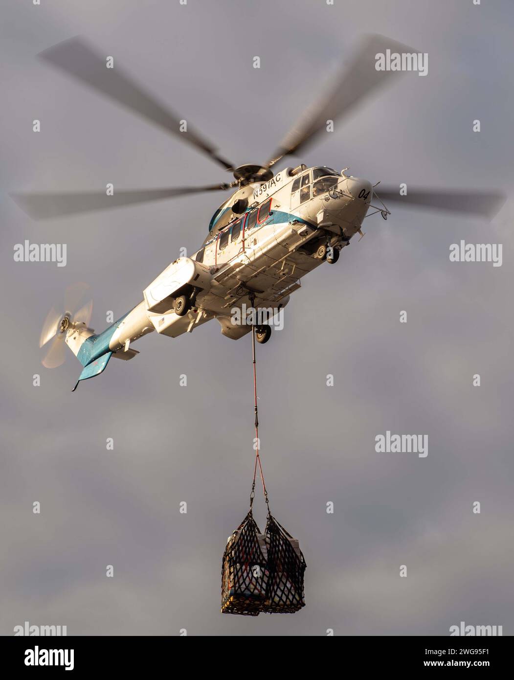 PACIFIC OCEAN (Jan. 28, 2024) An AS-332 Super Puma, assigned to the ...