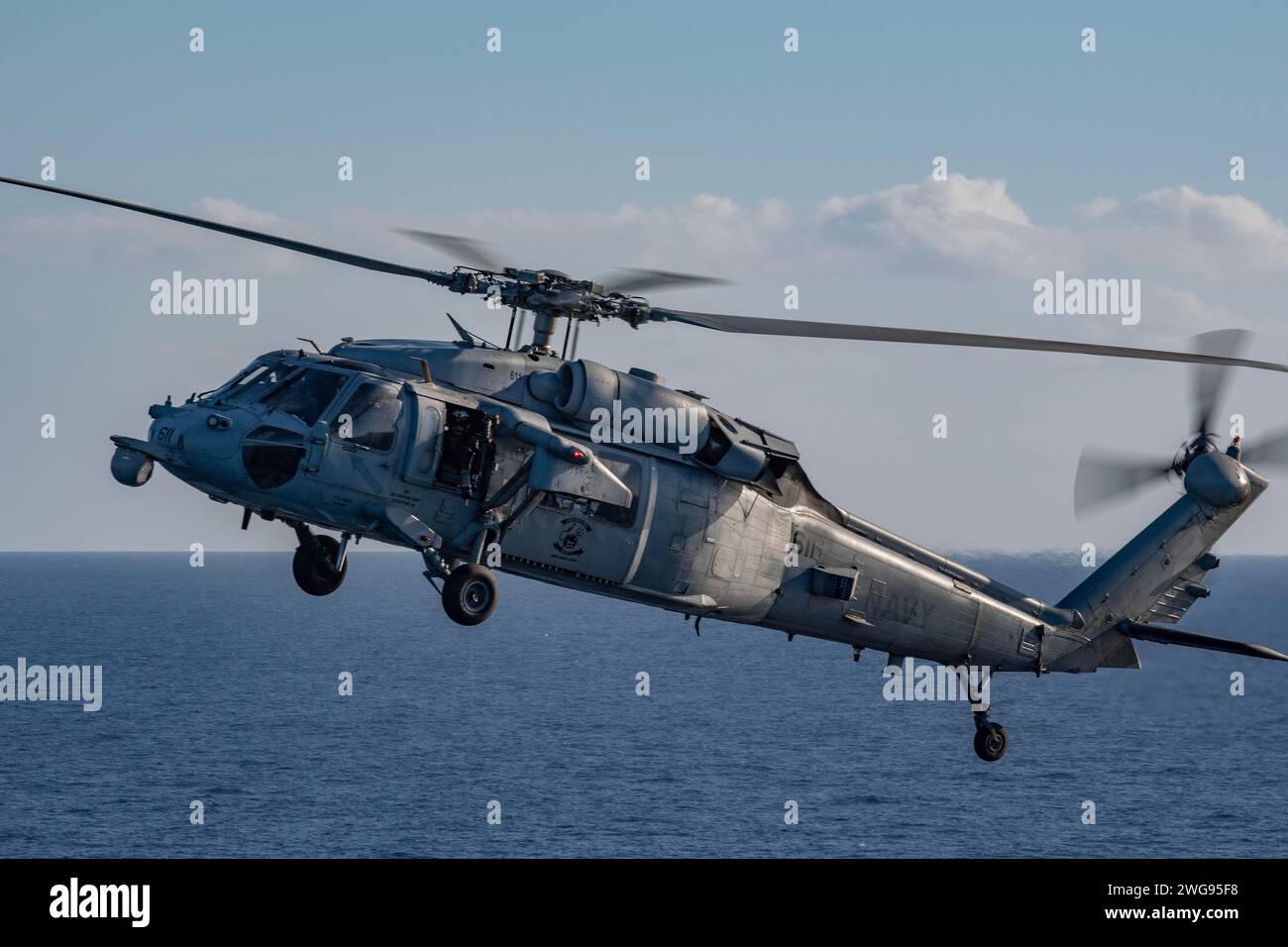 PHILIPPINE SEA (Jan. 31, 2024) An MH-60S Seahawk assigned to the "Eight ...
