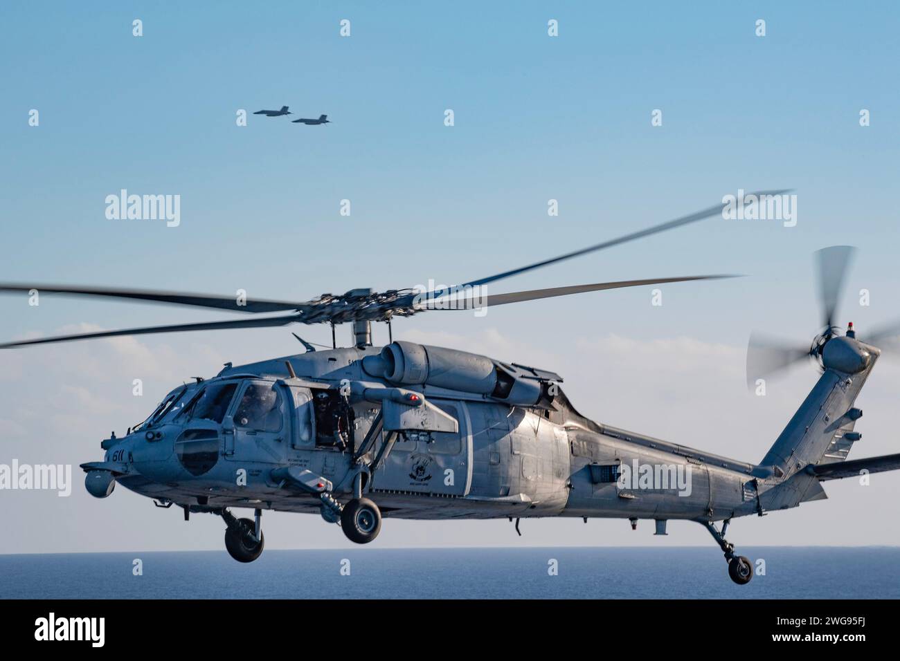 PHILIPPINE SEA (Jan. 31, 2024) An MH-60S Seahawk assigned to the "Eight ...