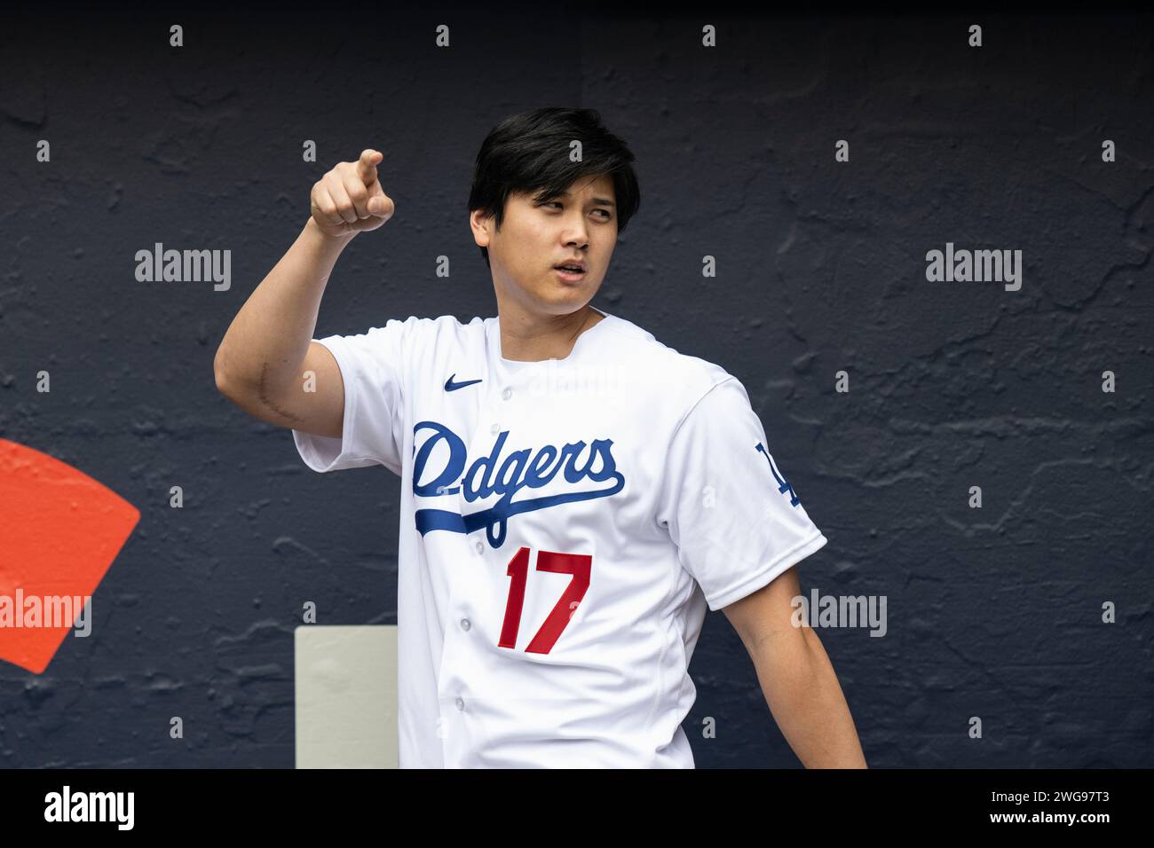 Los Angeles Dodgers' Shohei Ohtani walks to the stage during the team's ...