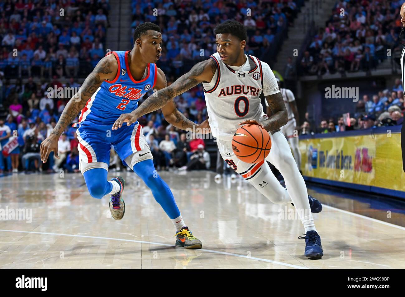 February 03, 2024: Auburn guard K.D. Johnson (0) drives to the basket ...