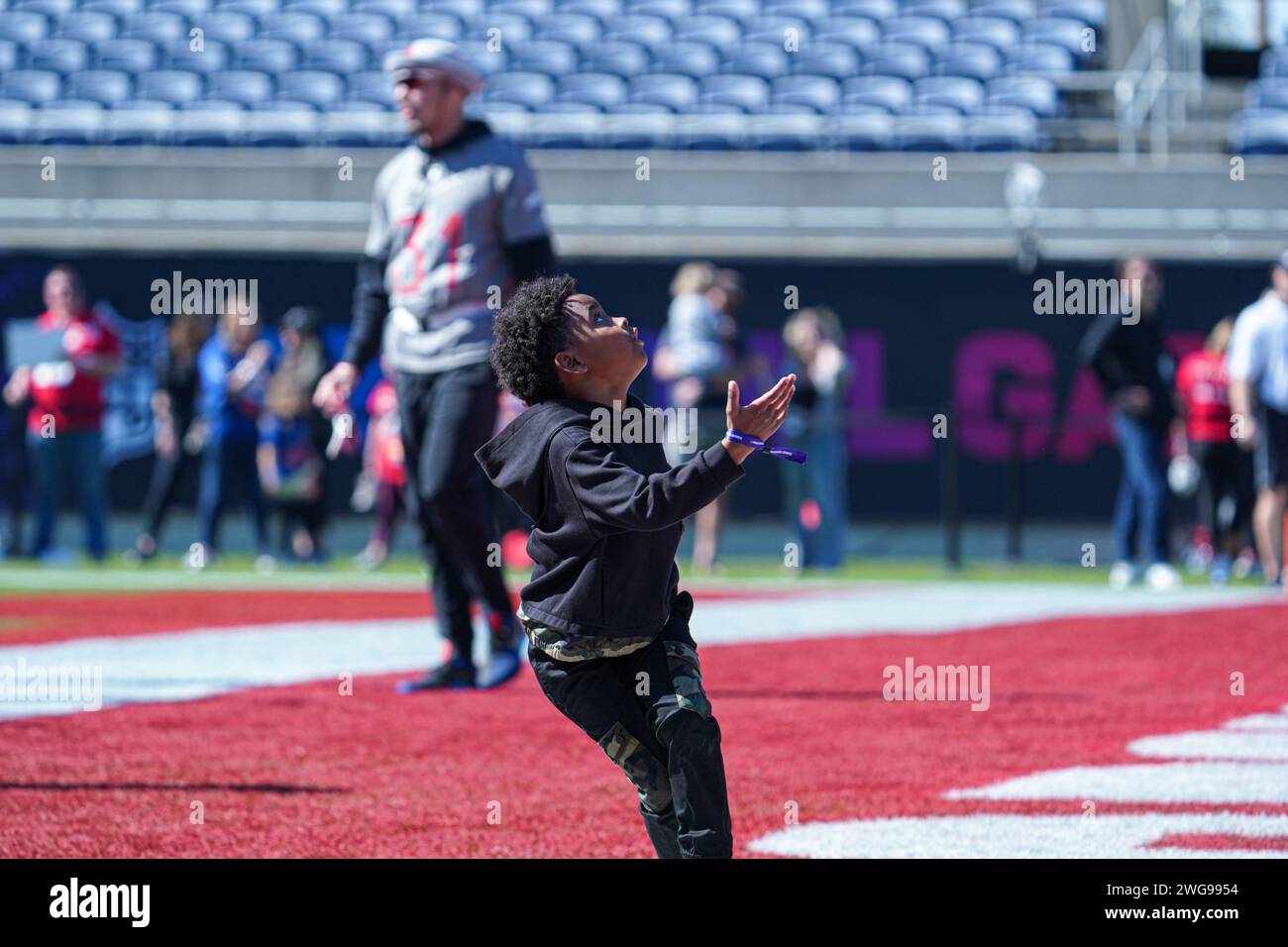 Orlando, Florida, USA, February 2, 2024, Child playing with the AFC players During AFC vs NFC ...