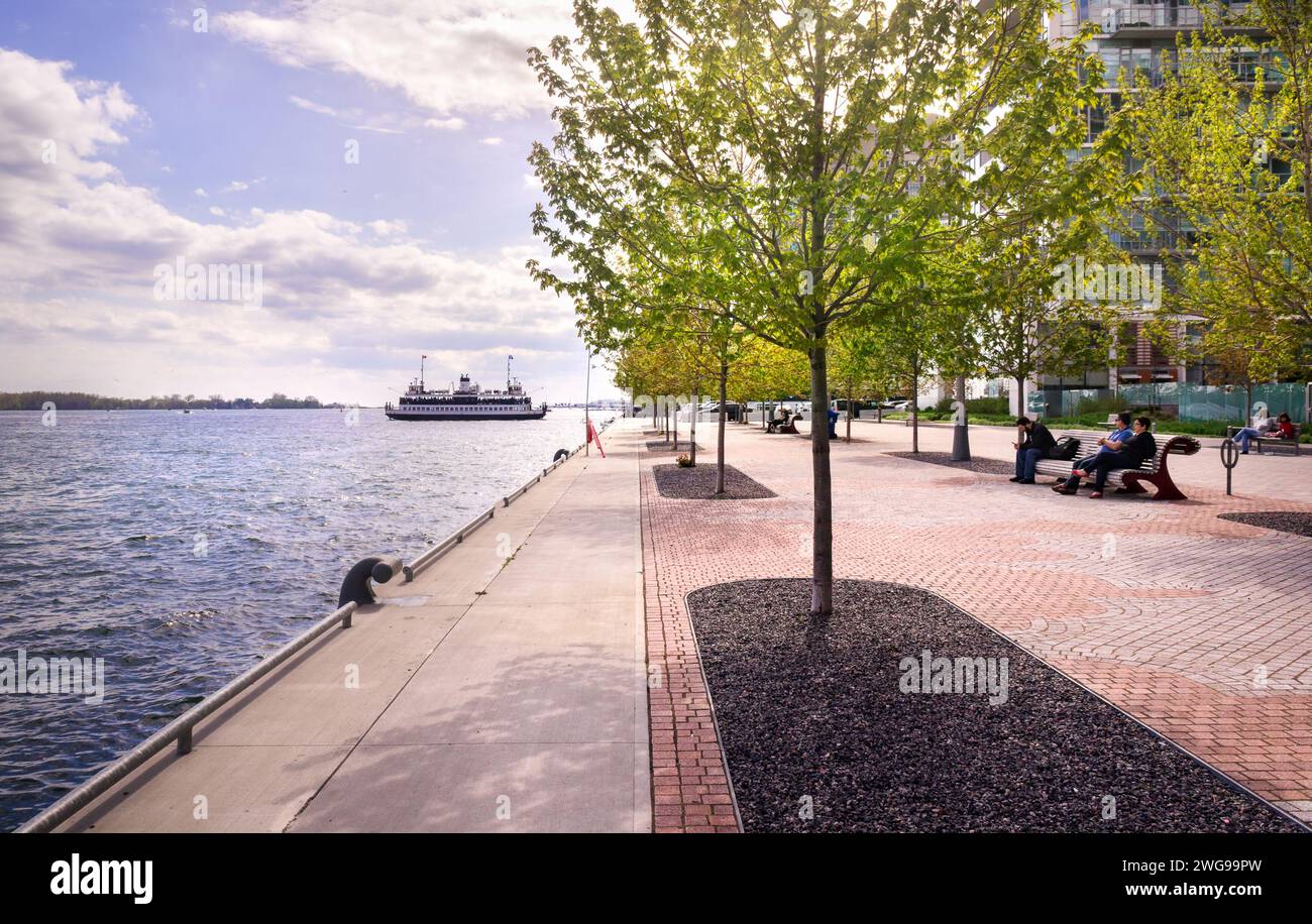 Spring view along Toronto Water's Edge Promenade with famous Toronto ...