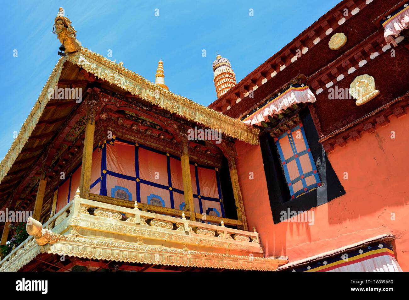 Temples in Tibet are commonly decorated with religious symbols, and ...