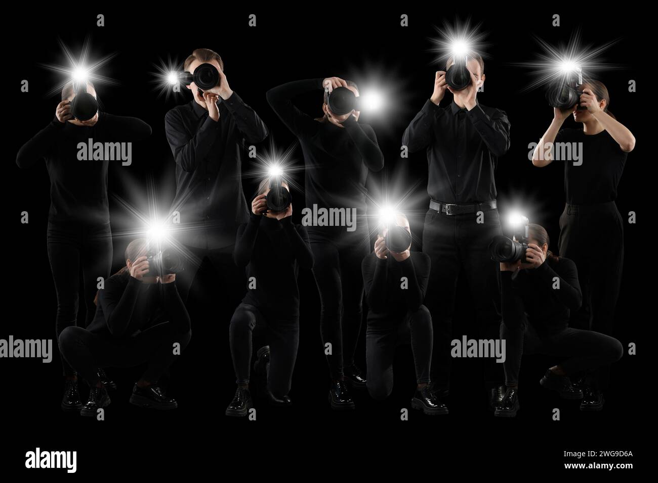 Group of photographers with cameras on black background. Paparazzi taking pictures with flashes ...