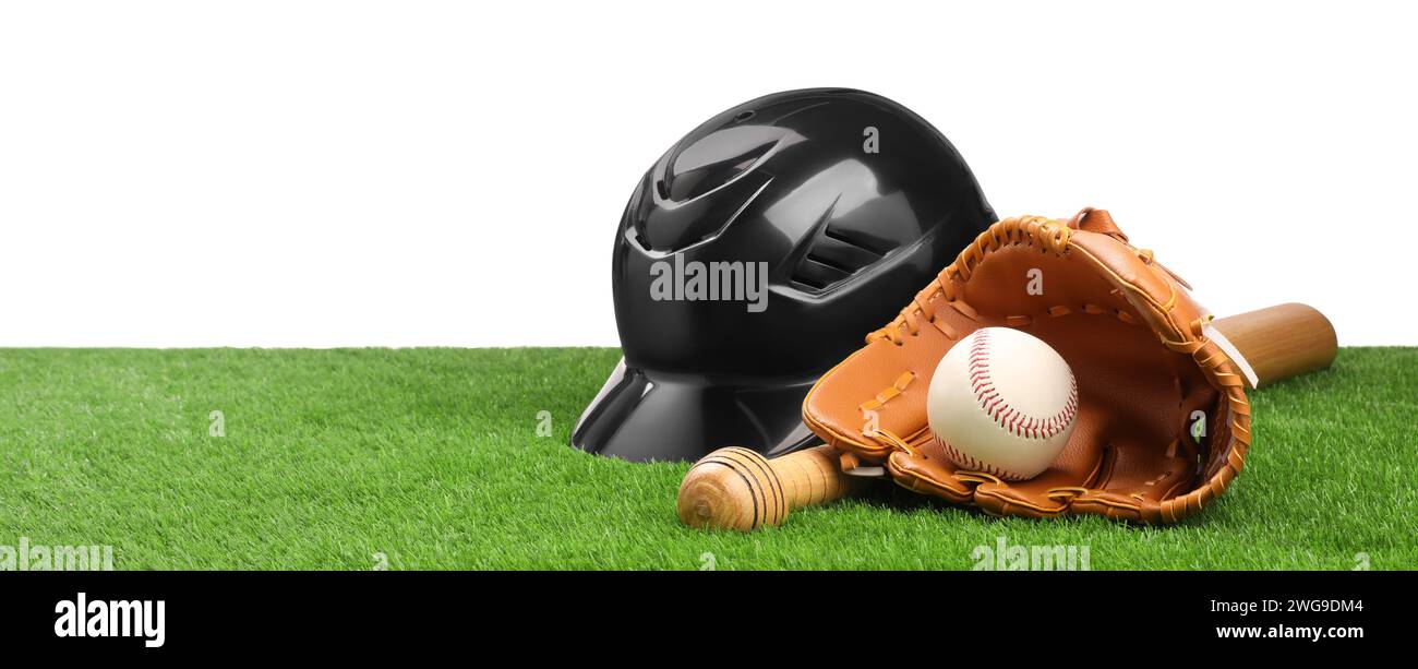 Baseball bat, ball, batting helmet and glove on artificial grass ...