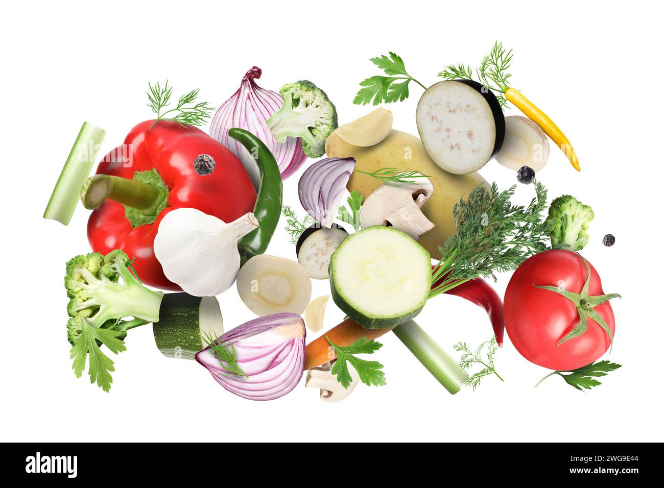 Different fresh vegetables and spices in air on white background Stock ...
