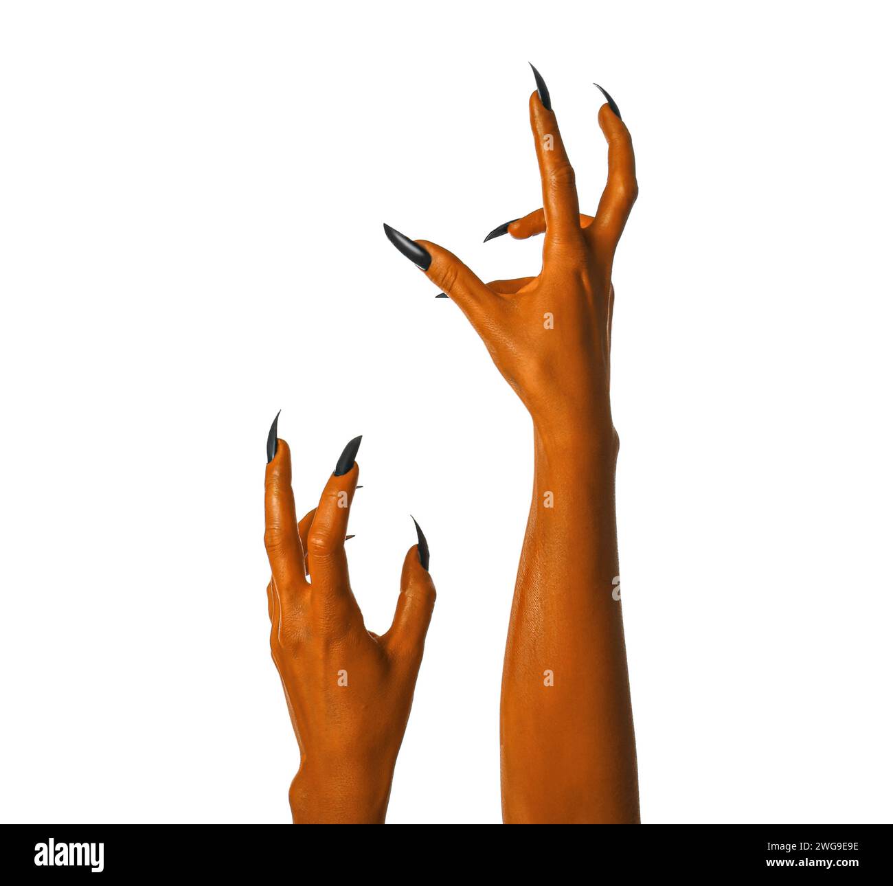 Red devil hands black nails hi-res stock photography and images - Alamy