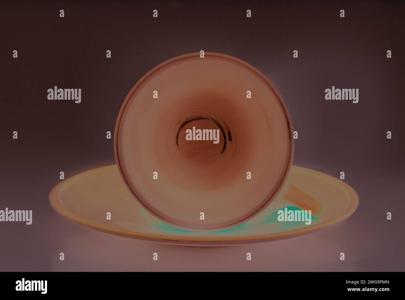 Abstract minimalist cup saucer in colorful glassware or pottery. Modern ...