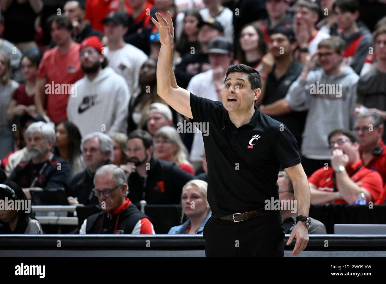 Cincinnati head coach Wes Miller signals to players against Texas Tech ...