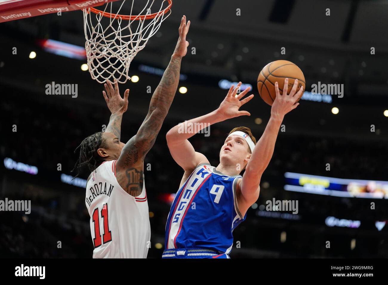 Chicago Bulls forward DeMar DeRozan, left, blocks a shot from ...