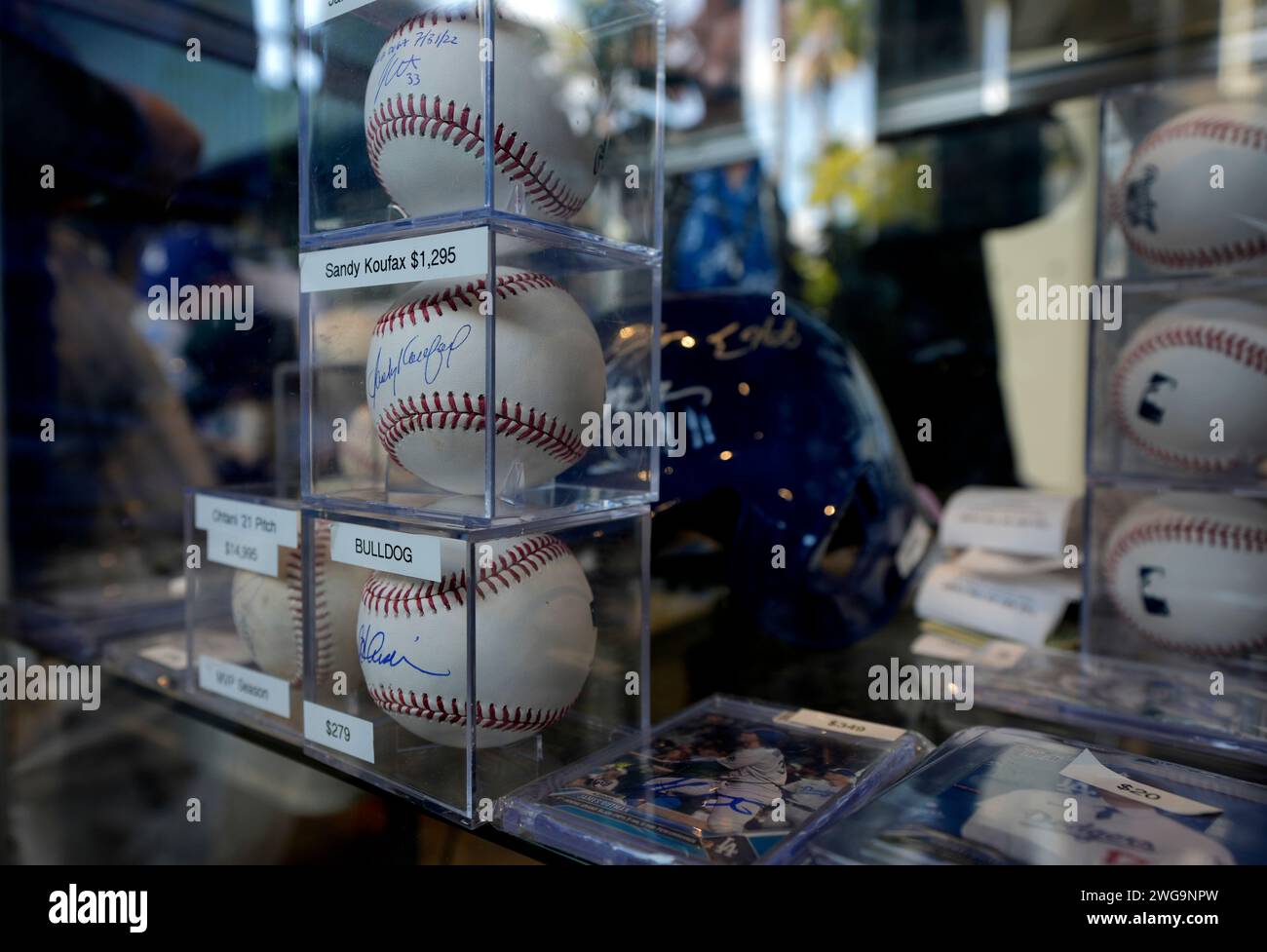 Signed baseballs by Los Angeles Dodgers players are displayed for sale ...